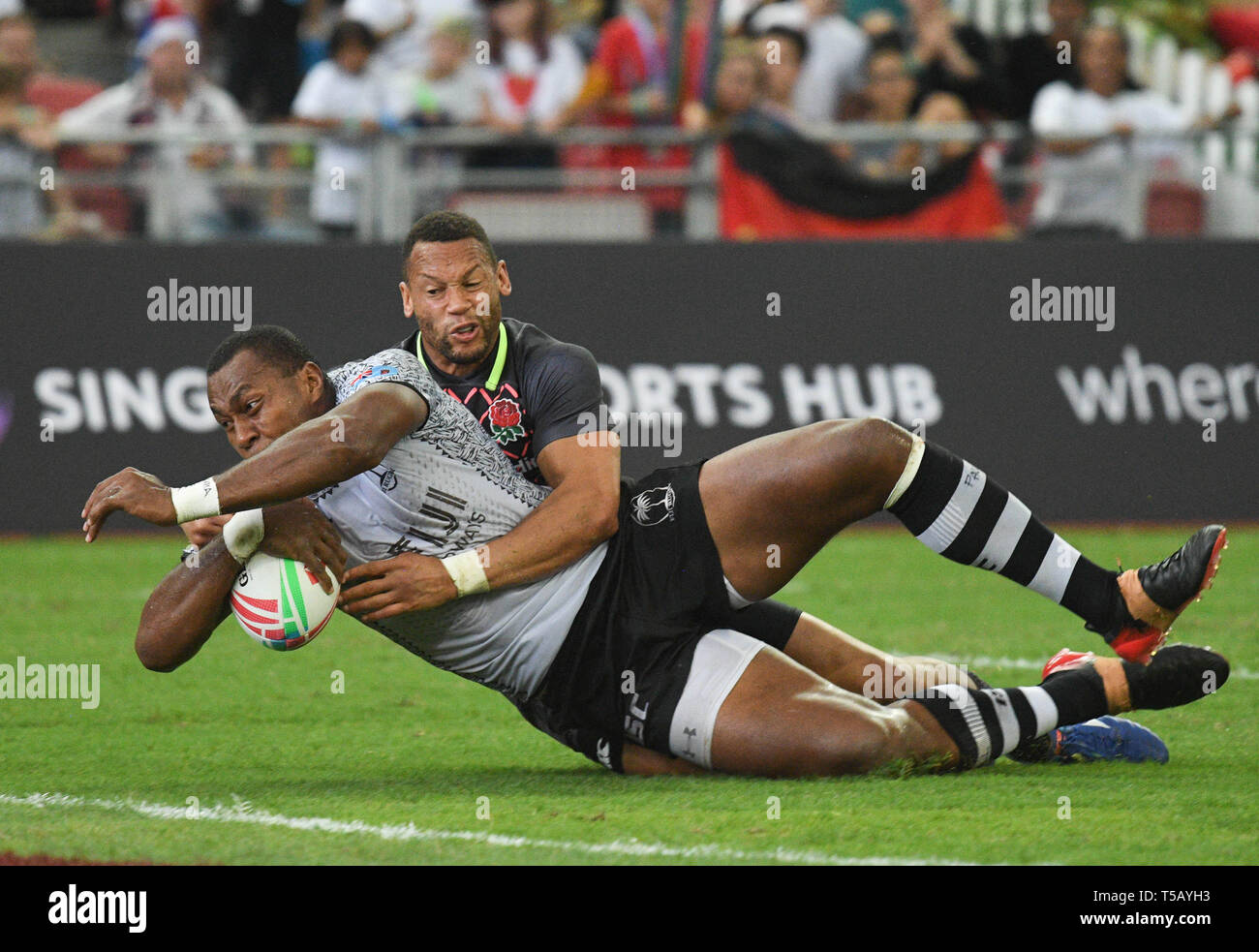 Singapore, Singapore. 14th Apr, 2019. England's Dan Norton's makes a try saving tackle during ...
