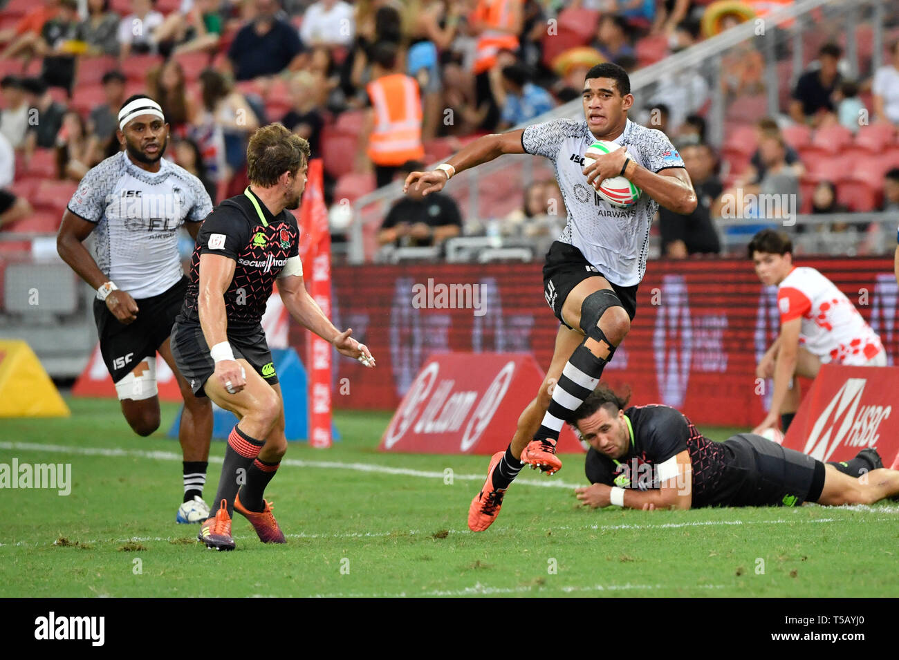 Singapore, Singapore. 14th Apr, 2019. Fiji's Meli Derenalagi breaks ...
