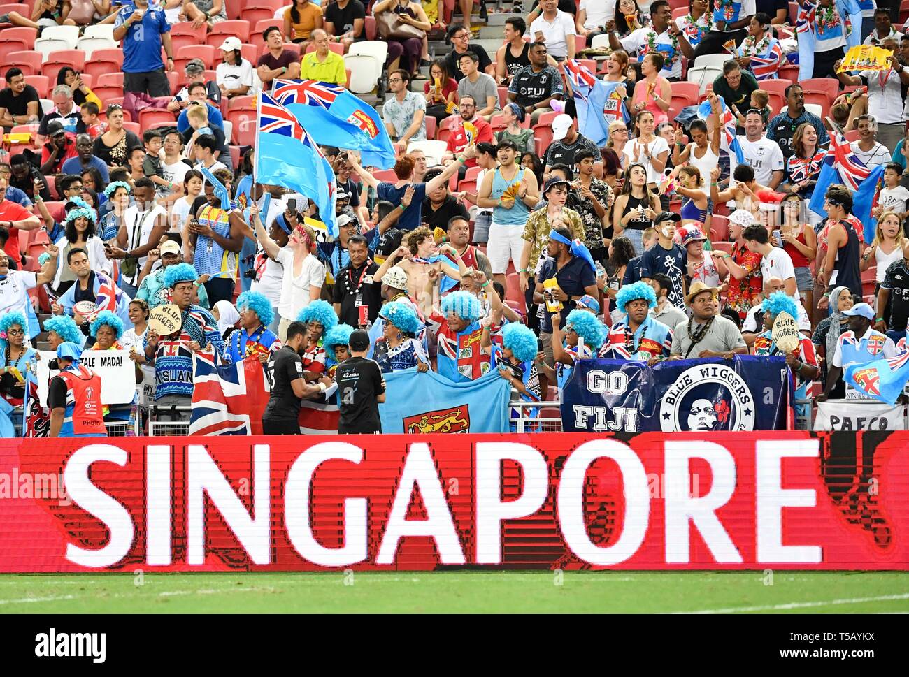 Singapore, Singapore. 14th Apr, 2019. The "Blue Wiggers" Fiji fans cheer on their team during ...