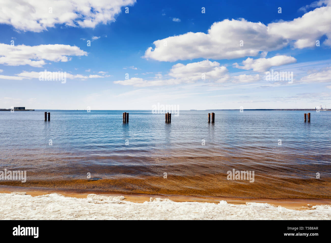 Bright colored sea landscape at sunny day. Clouds, coastal line and old ...