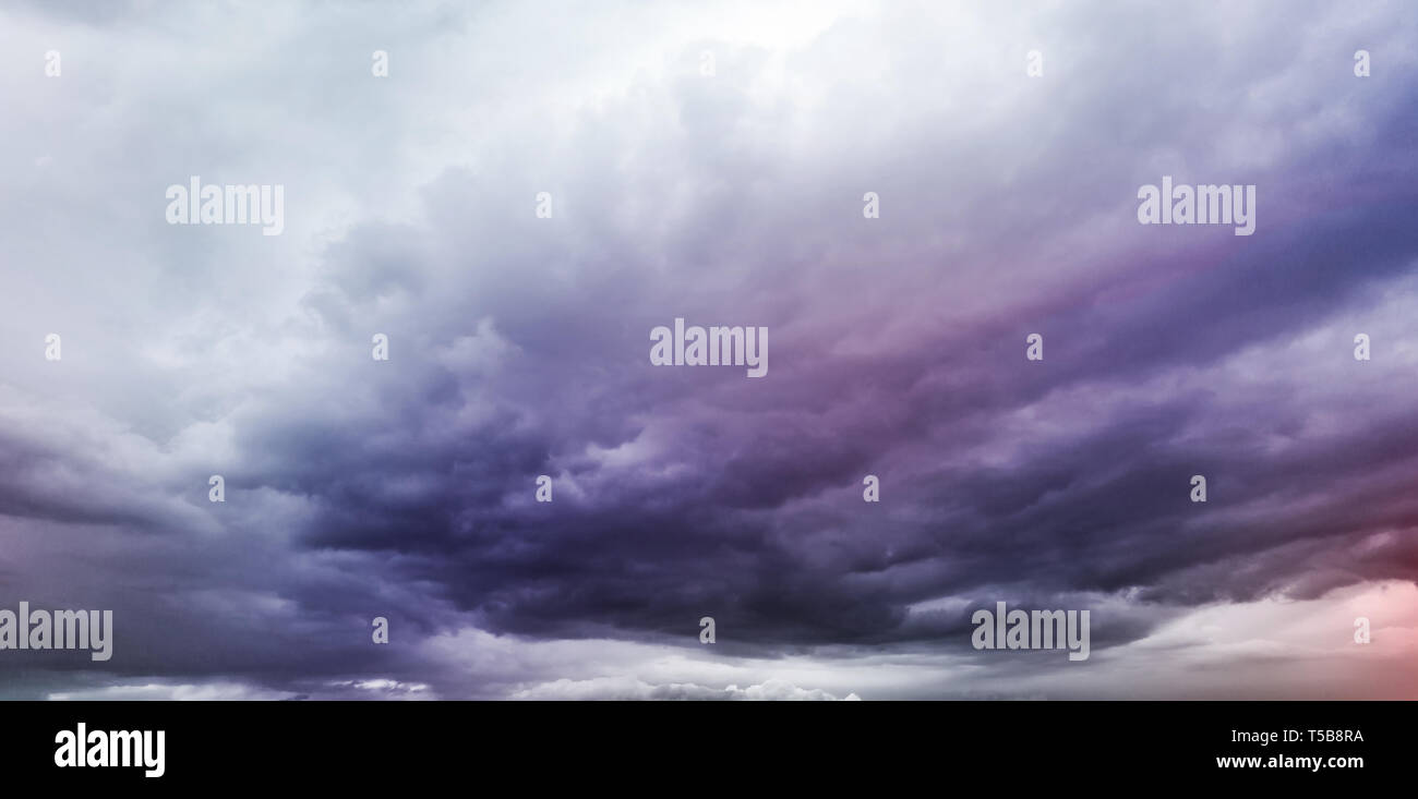 Dark storm clouds background Stock Photo - Alamy