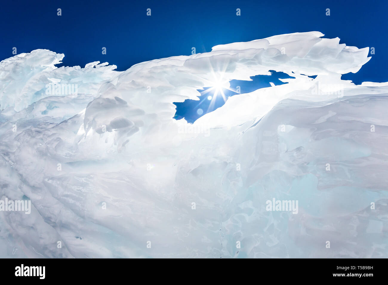 Frozen rime ice in an arch formation near the peak of Mount Shasta ...