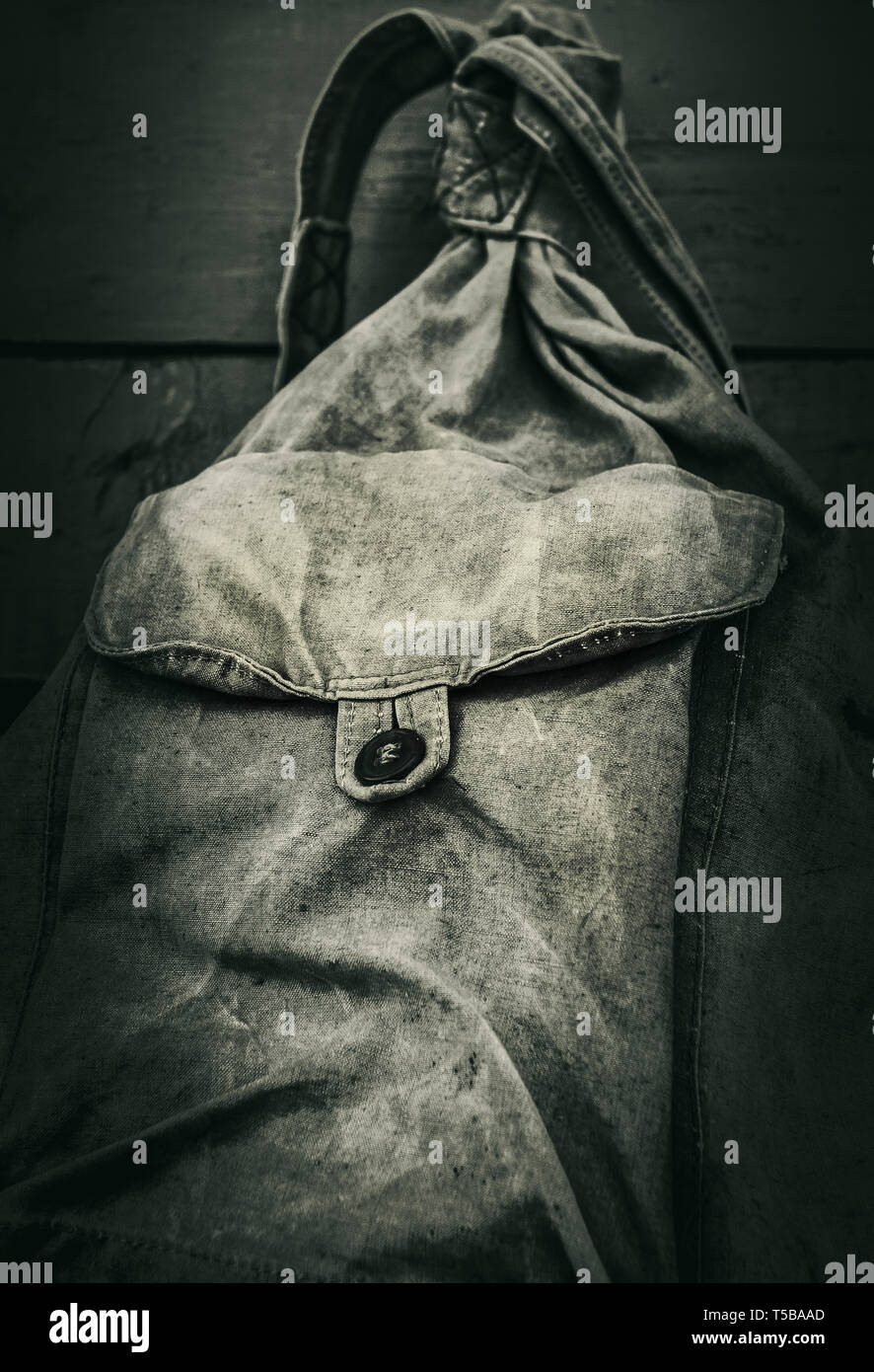 Dirty hiking boots sitting on bench with europe map Stock Photo - Alamy