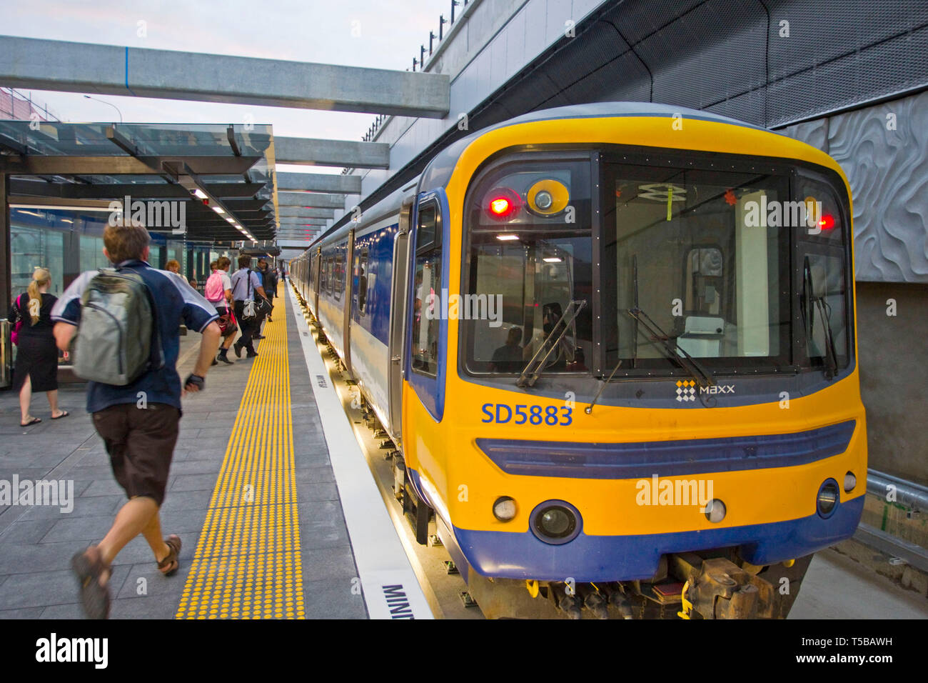 Passengers board one of the first trains to travel through the New Lynn ...