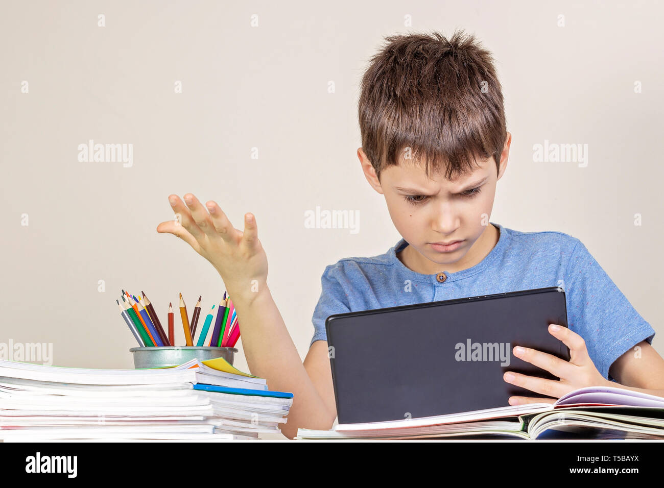 Surprised kid computer hi-res stock photography and images - Alamy
