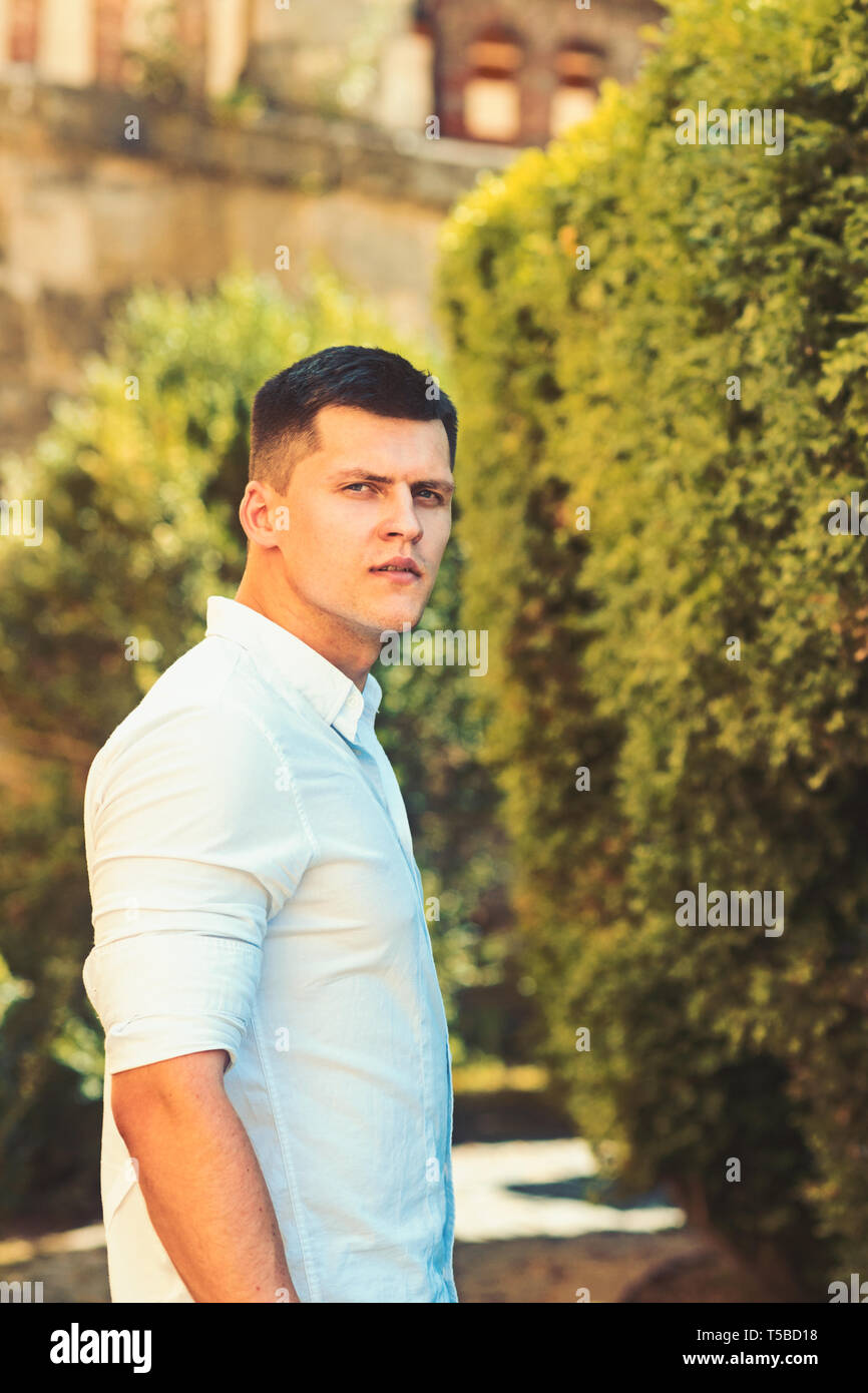 Adventure man enjoy summer day in park. Adventure guy on summer ...