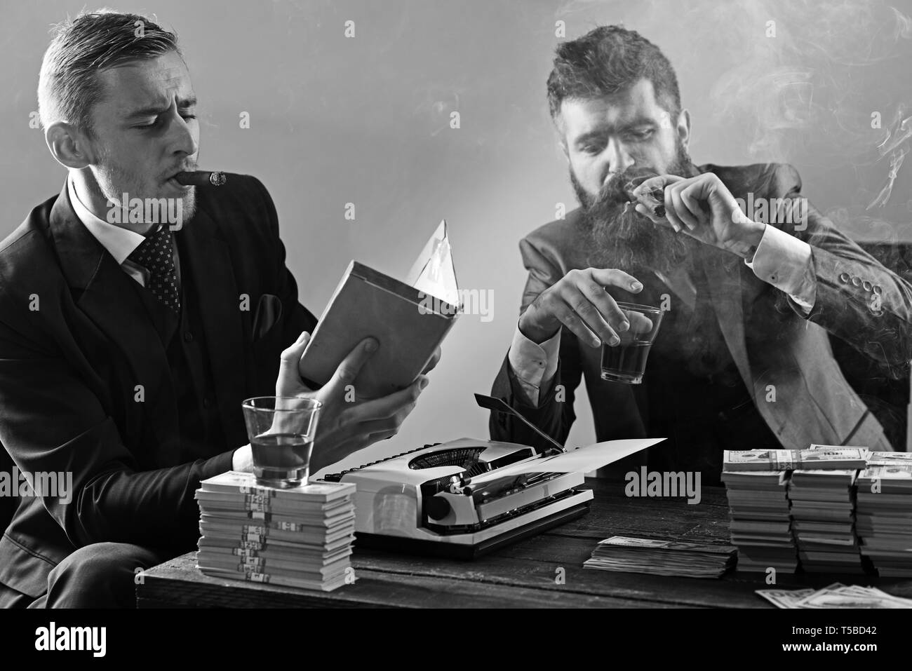 Bank employee counting cash Black and White Stock Photos & Images - Alamy