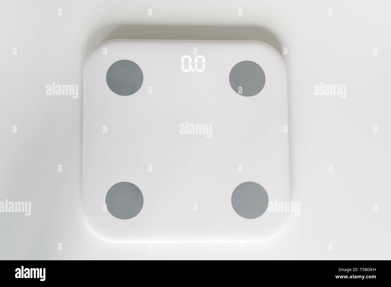 Kitchen scale over white background Stock Photo - Alamy