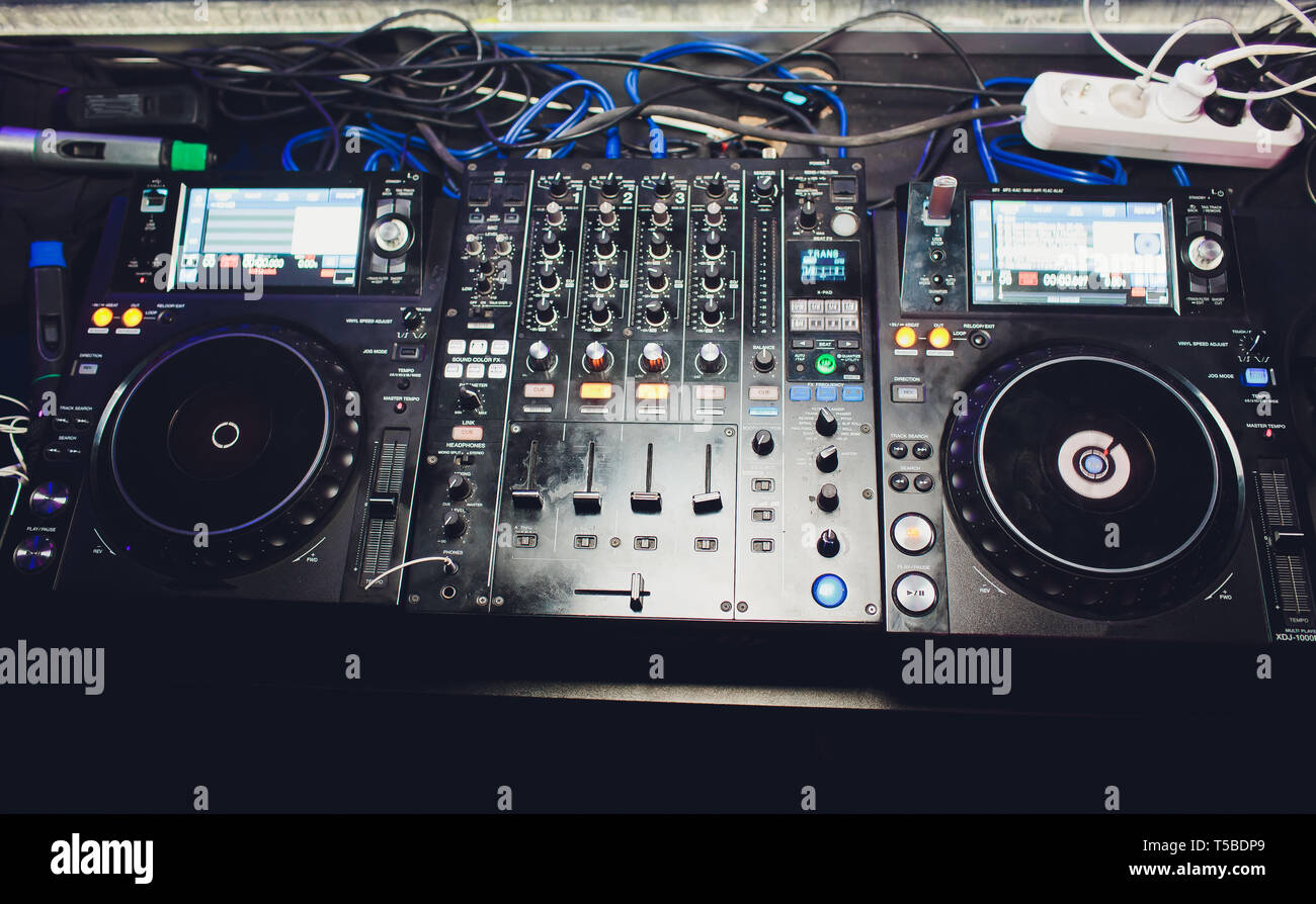 Male DJ playing music in club, top view Stock Photo - Alamy