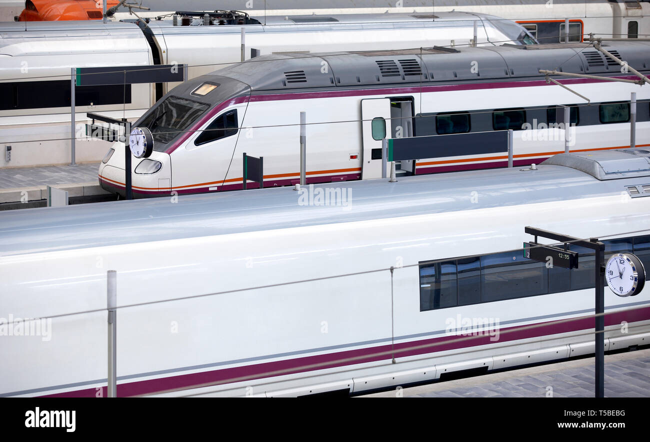 High-speed trains platforms in a railway station. Transportation Stock ...
