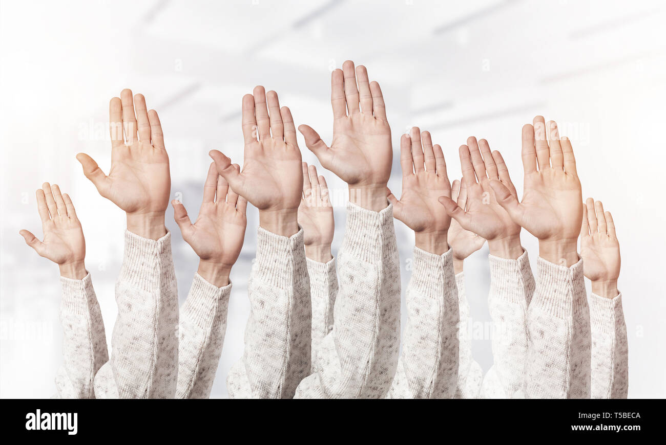 Row of man hands showing voting gesture Stock Photo - Alamy