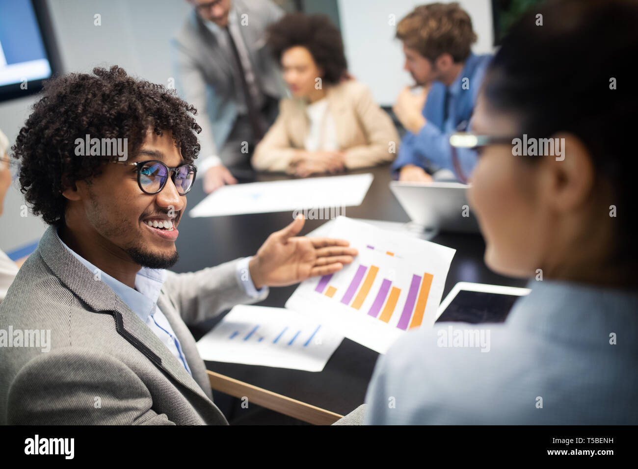 Businessman explaining ideas team hi-res stock photography and images ...