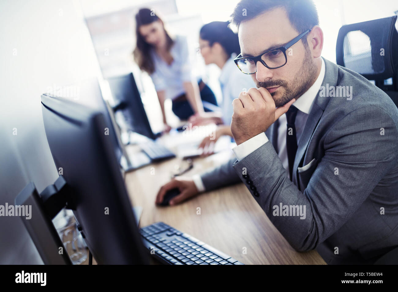 Successful business group of people at work in office Stock Photo - Alamy