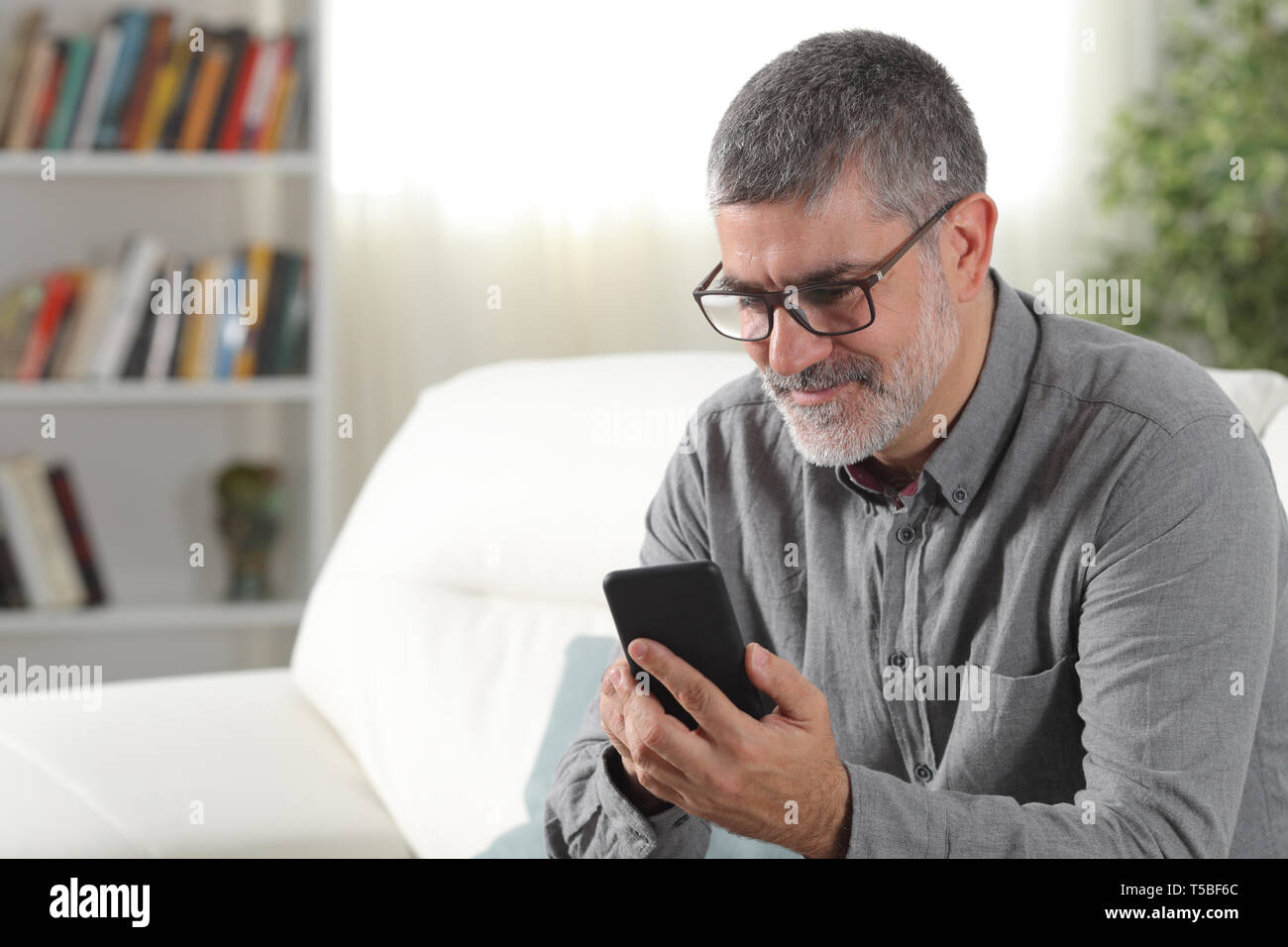 Middle aged man browsing social hi-res stock photography and images - Alamy