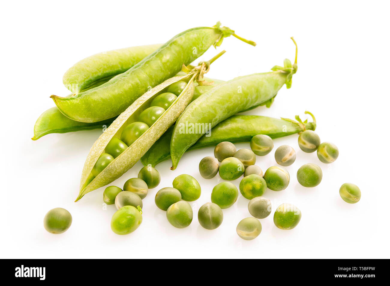 Fresh green peas isolated on white background Stock Photo - Alamy