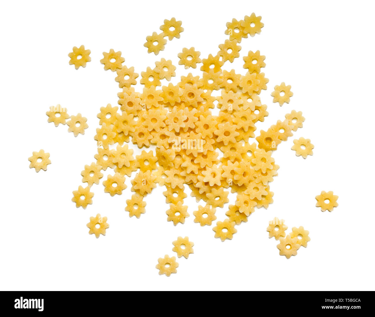 A portion of stars shaped pasta isolated on white Stock Photo - Alamy
