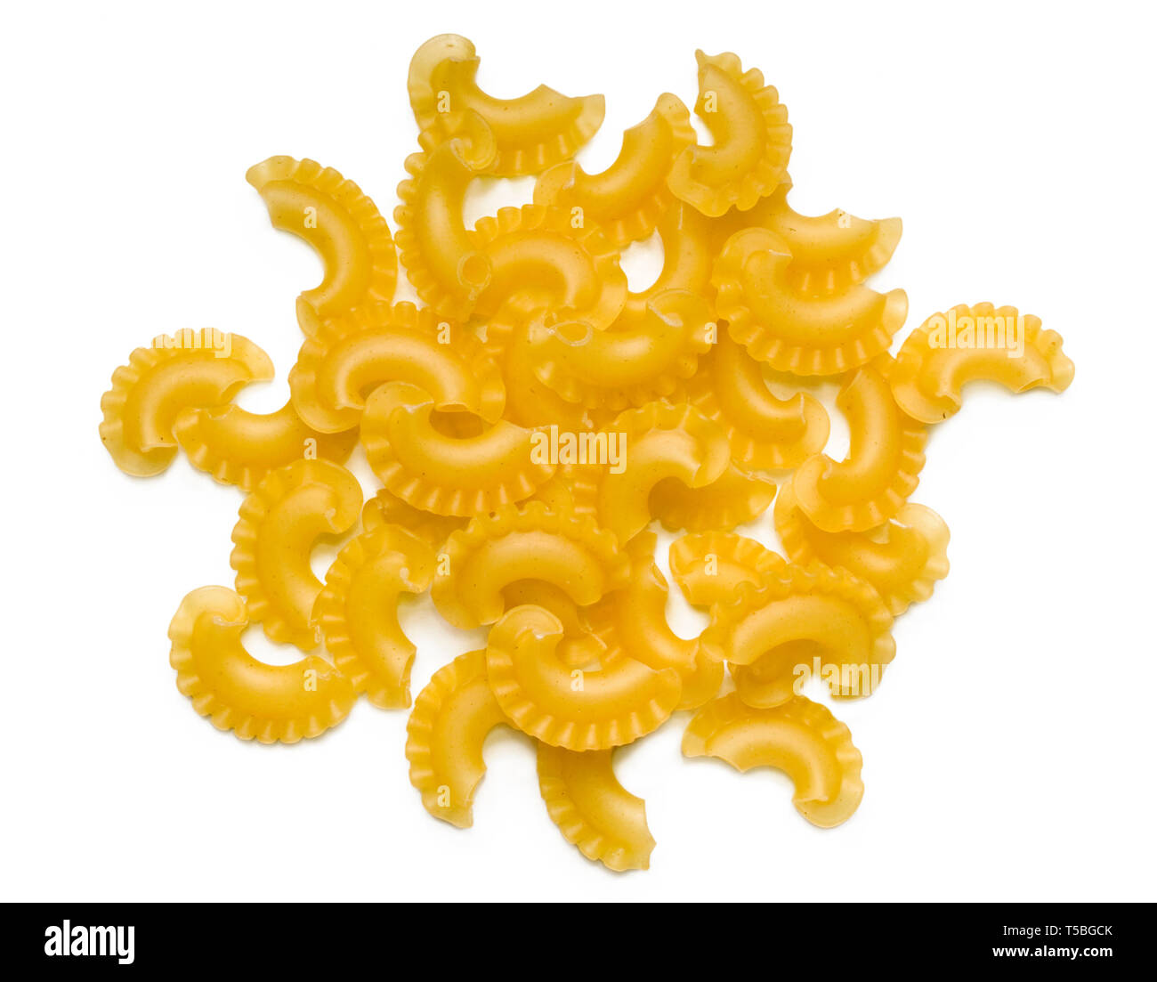 A portion of Creste di gallo italian pasta isolated on white Stock ...