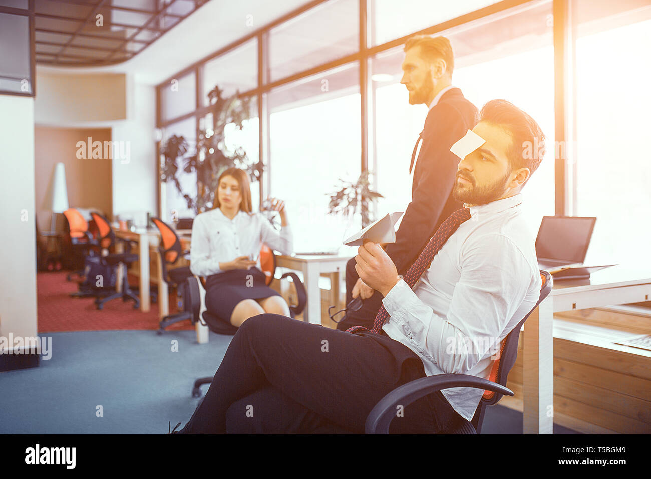Relaxing Man With Sticker On Forehead In Sunny Office After Meeting ...