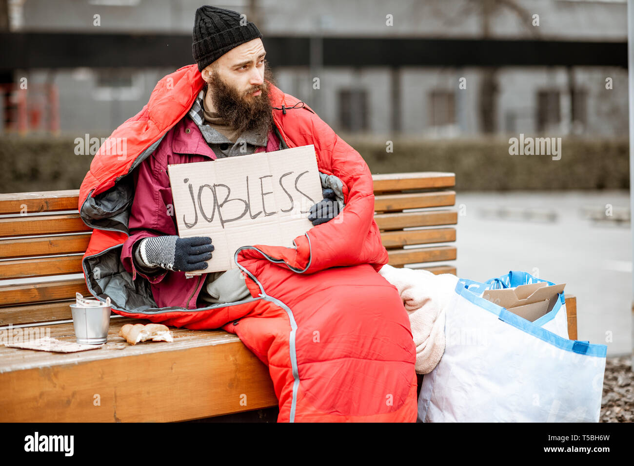 City worker begging homeless hi-res stock photography and images - Alamy