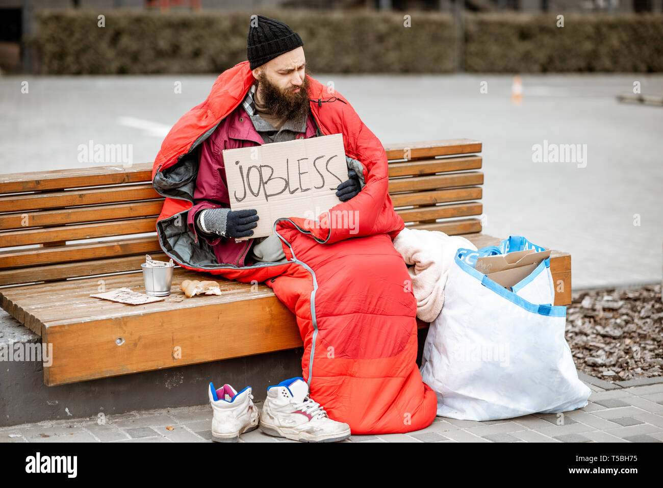 City worker begging homeless hi-res stock photography and images - Alamy