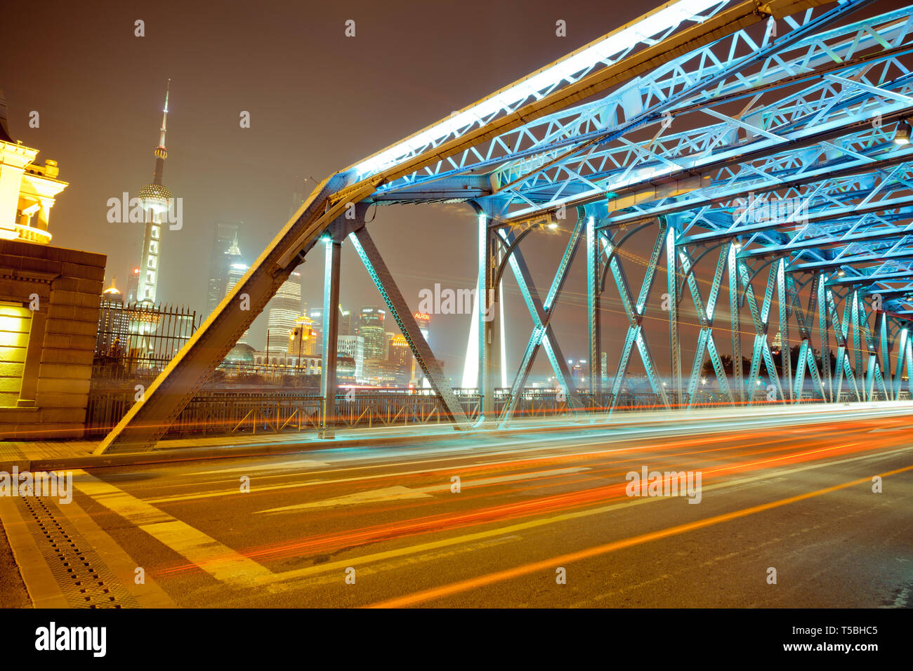 Shanghai Waibaidu bridge and light tracks at night. Light tracks of ...