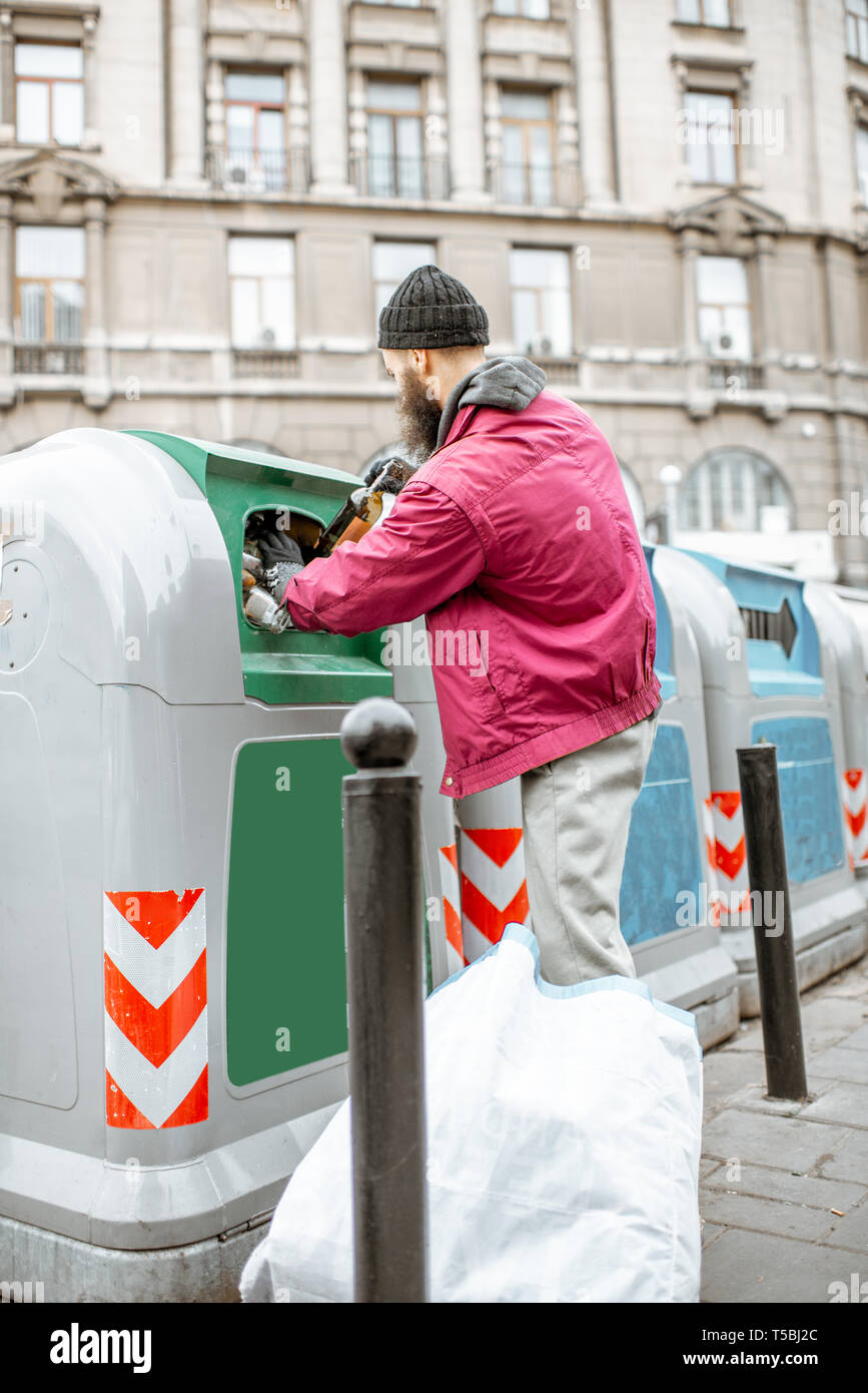 Man Searching In Garbage Container High Resolution Stock Photography ...