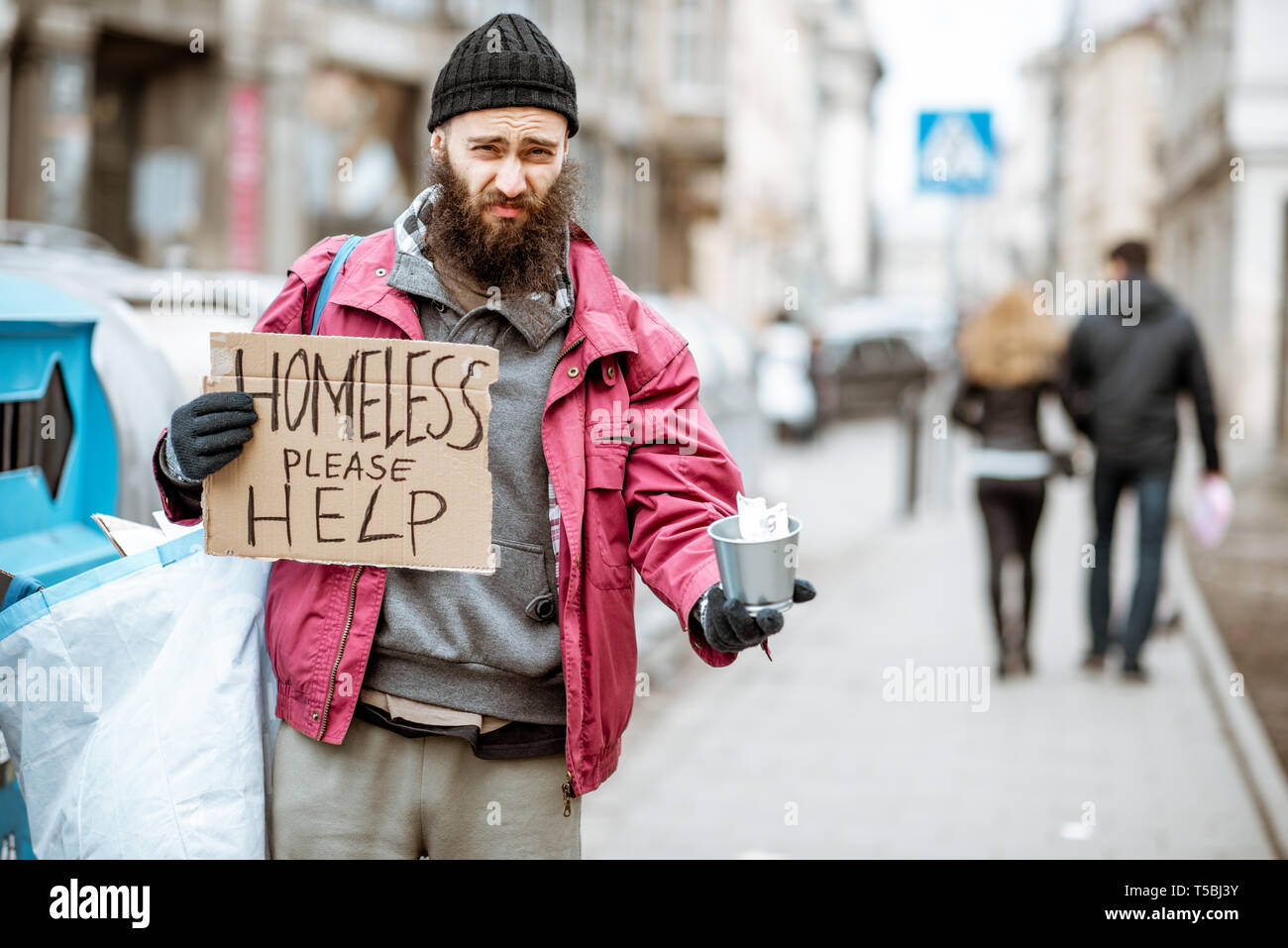 Homeless people cup hi-res stock photography and images - Alamy