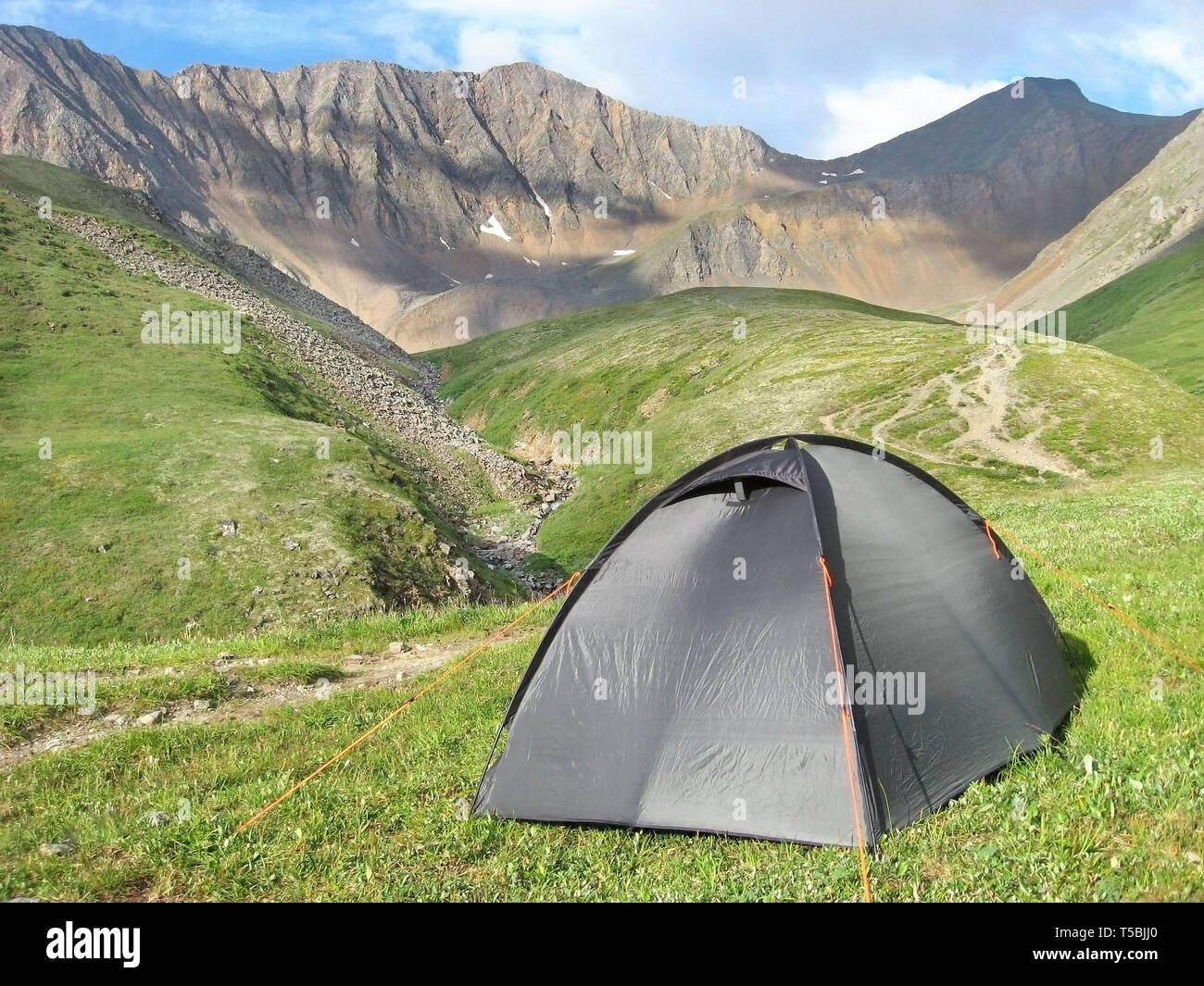 Tent in high mountain. Siberian landscape. Russia. Trekking. Sport ...