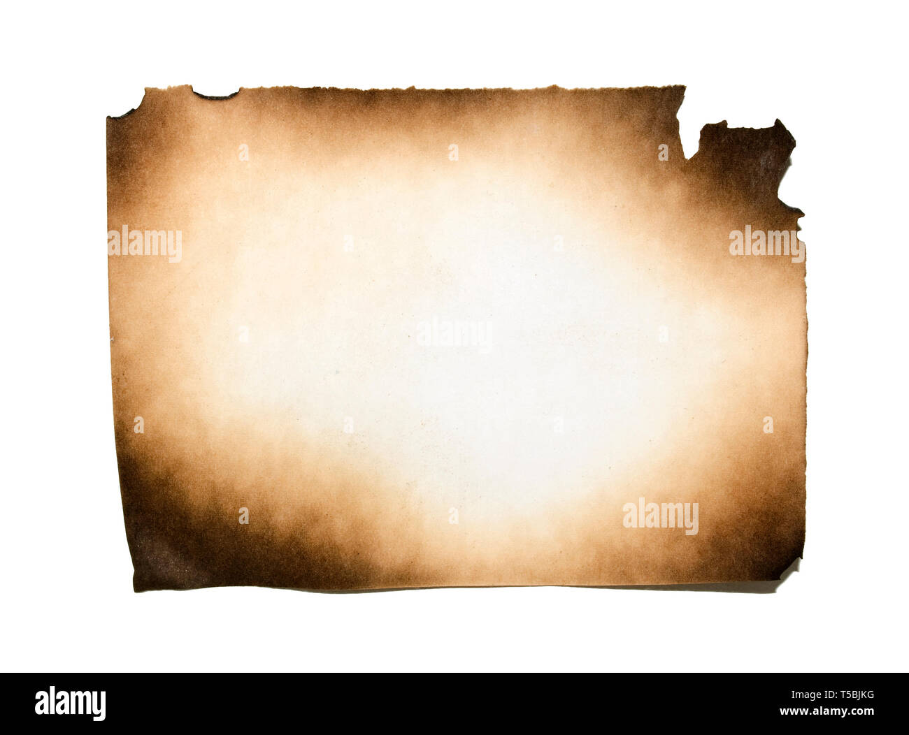 Burned paper on white background with clipping path Stock Photo - Alamy