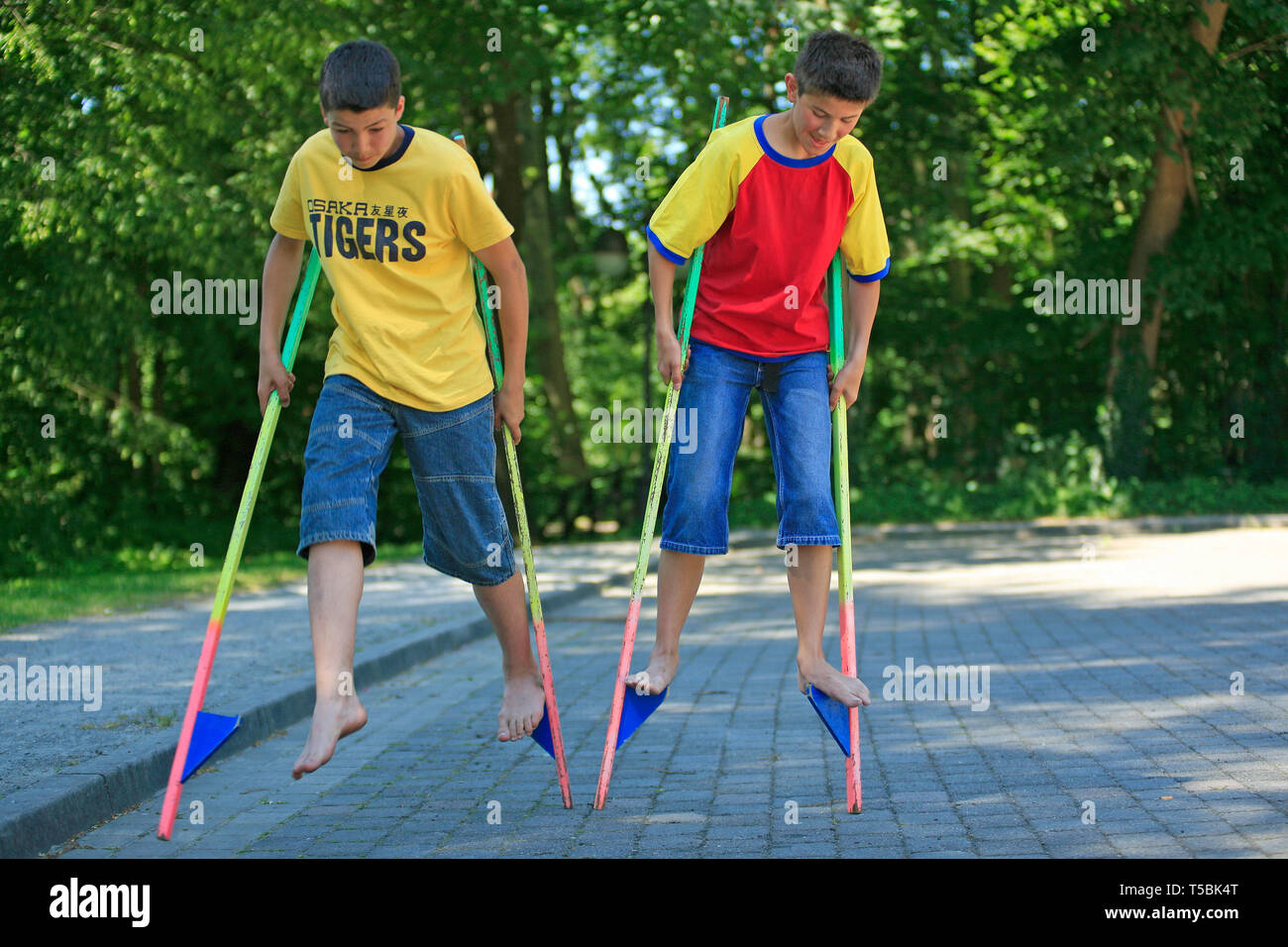 Boys On Stilts Stock Photos & Boys On Stilts Stock Images - Alamy