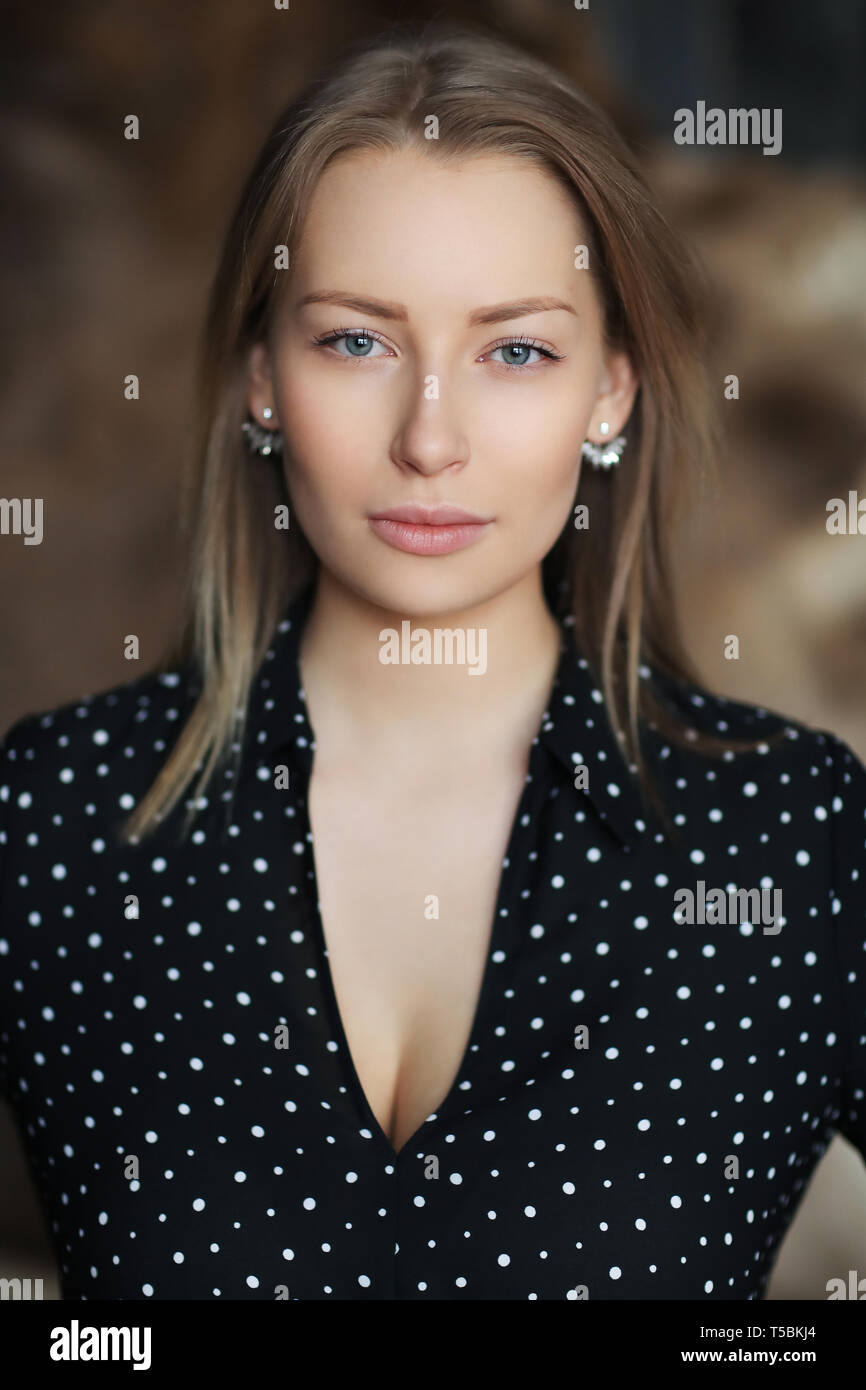 Woman is wearing dotted dress Stock Photo - Alamy