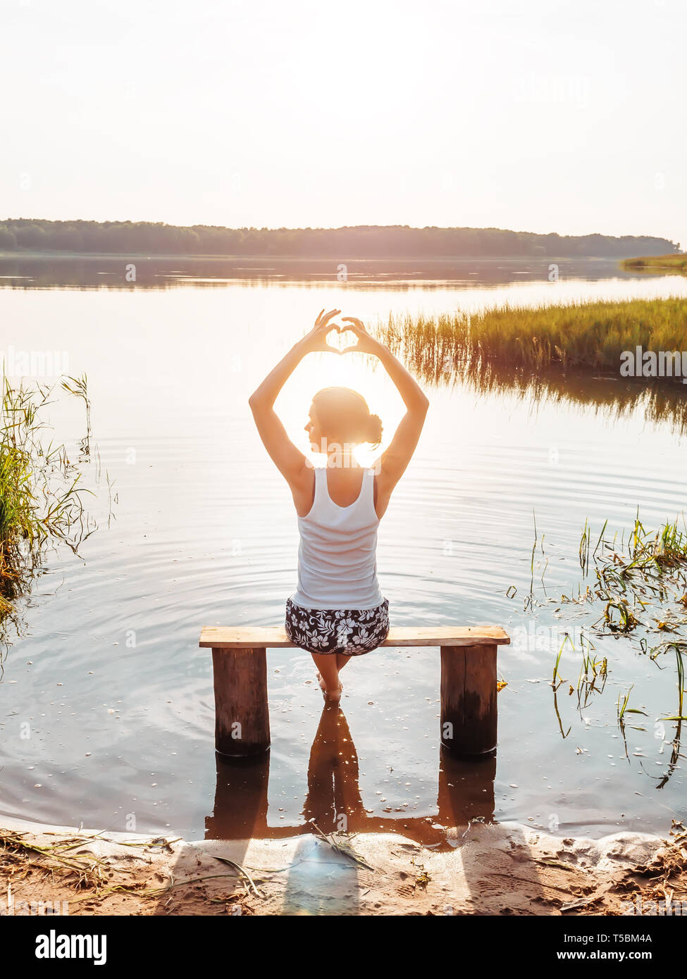 Hand and arm on back of bench hi-res stock photography and images - Alamy