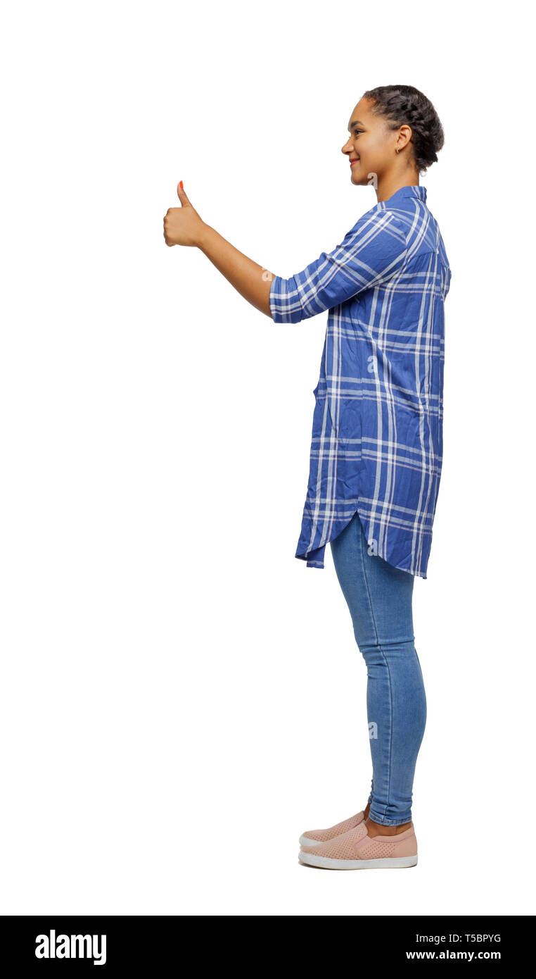 Side view of a black woman showing thumb up. Rear view people ...