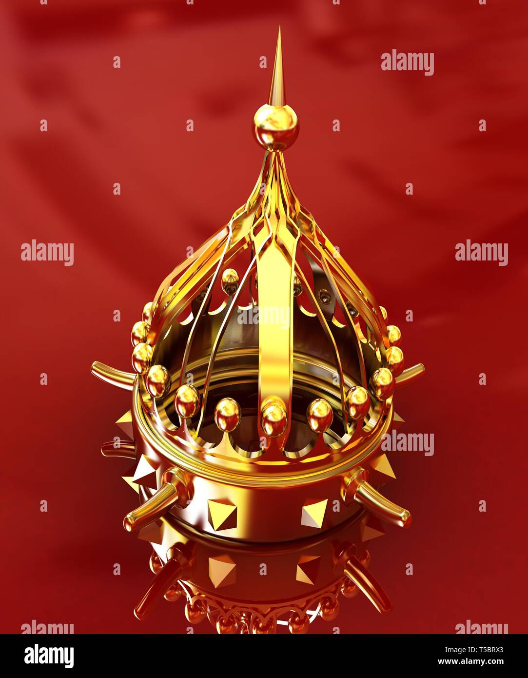 Gold crown isolated on red background Stock Photo - Alamy