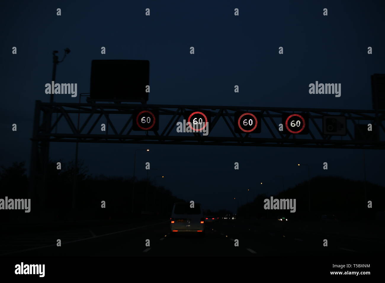 Reduce speed signs hi-res stock photography and images - Alamy