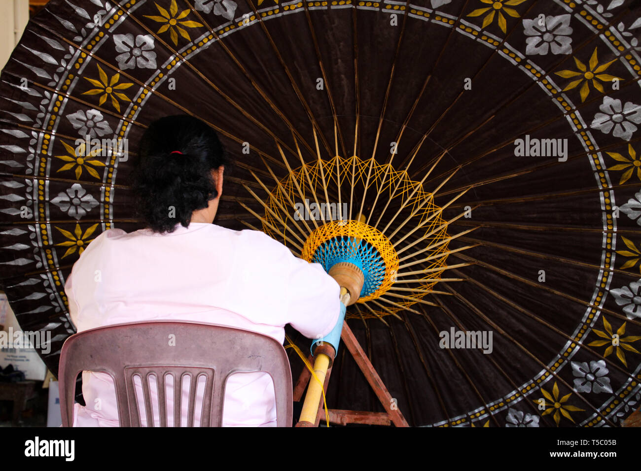 Working umbrella hi-res stock photography and images - Alamy