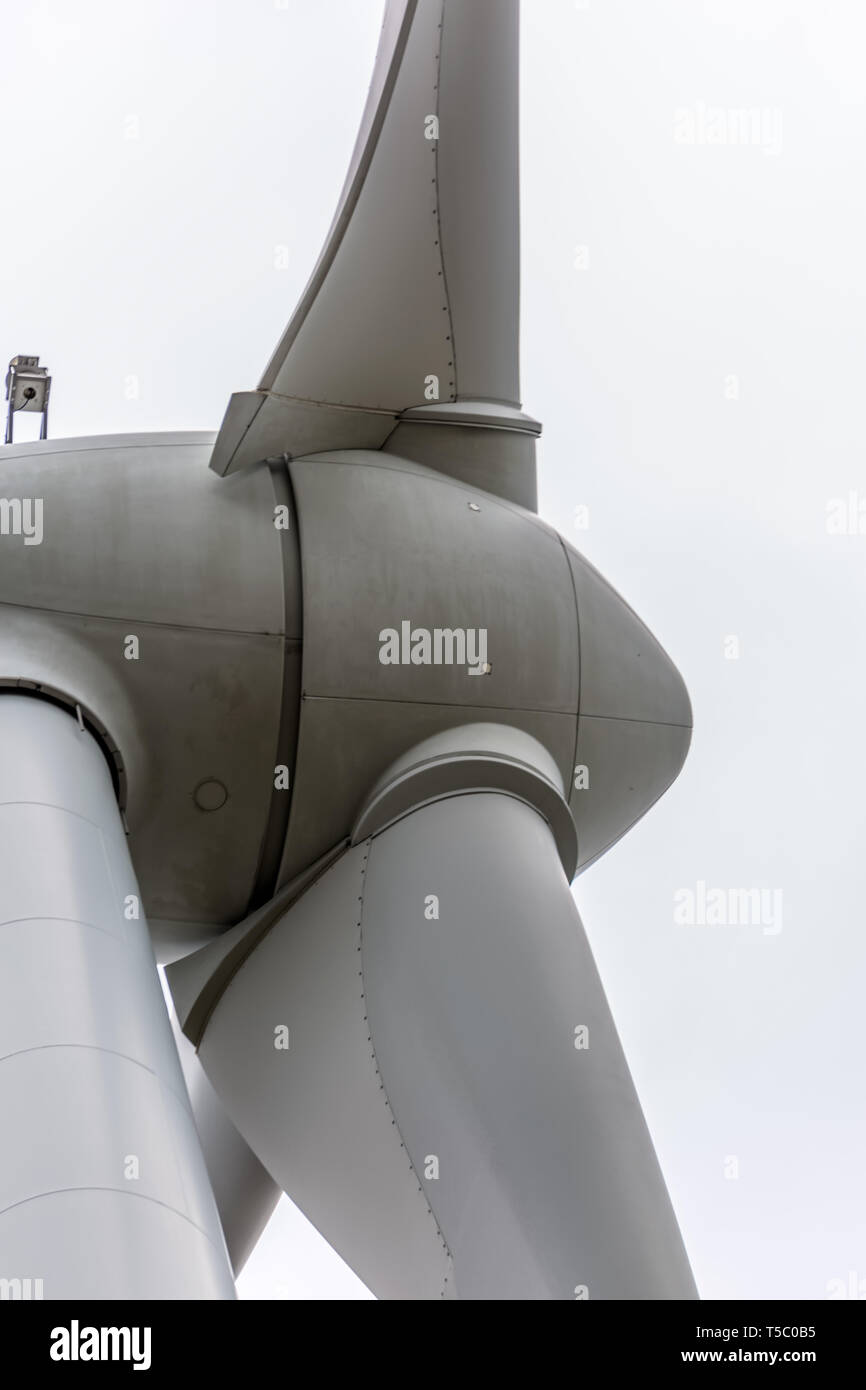 Detailed close up view of a wind turbines; generator, rotor and blade ...