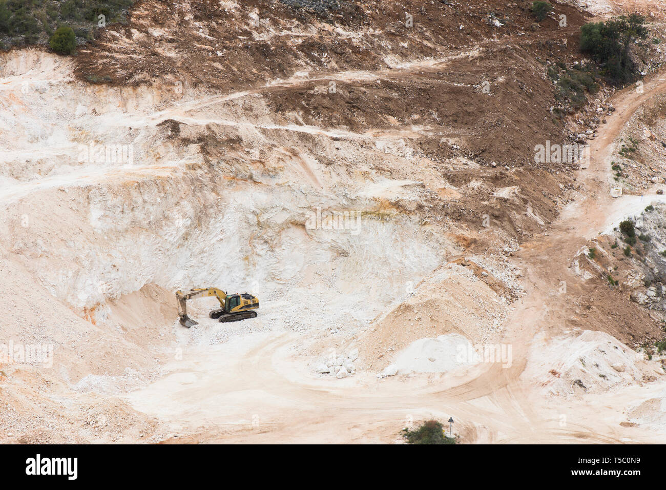 Sand and gravel, dolomite quarry, with a single Crawler Excavator at ...