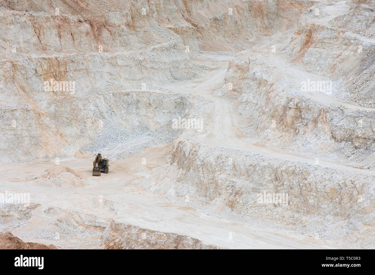 Sand and gravel, dolomite quarry, with a single Crawler Excavator at ...