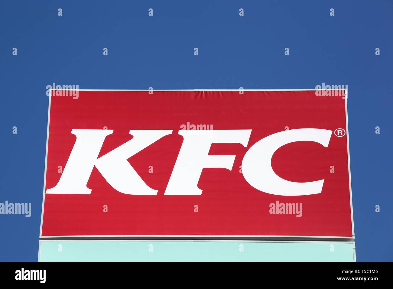 Vejle, Denmark - April 12, 2018: KFC logo on a panel. KFC is a fast ...