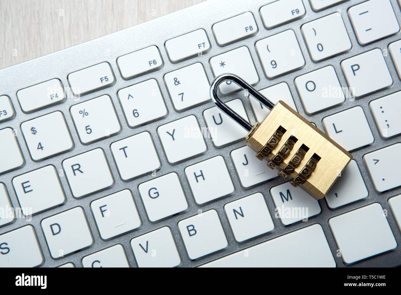padlock on a computer keyboard top view Stock Photo - Alamy
