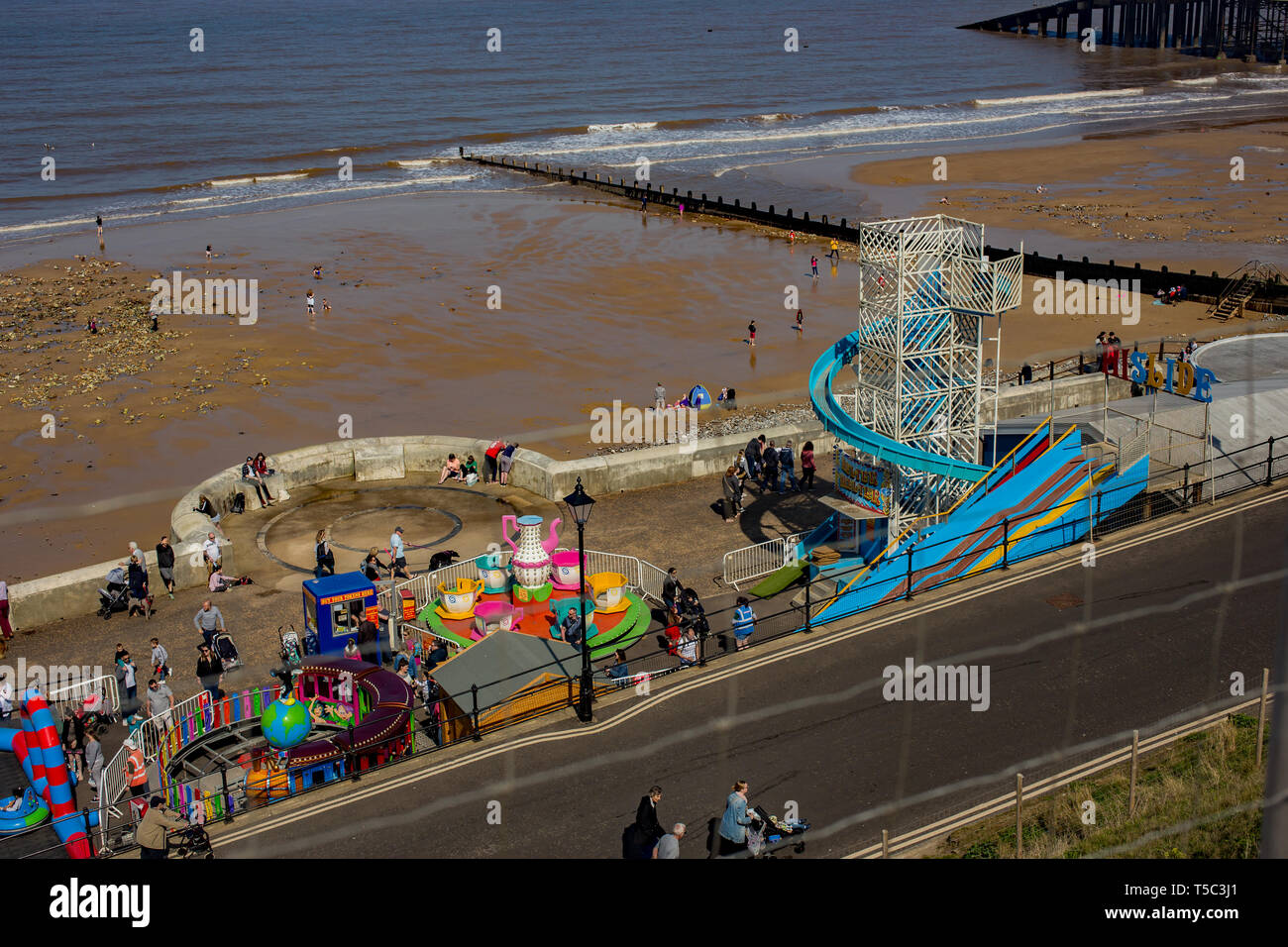 Top down view of the small fun fair on Cromer’s sea front. This small ...