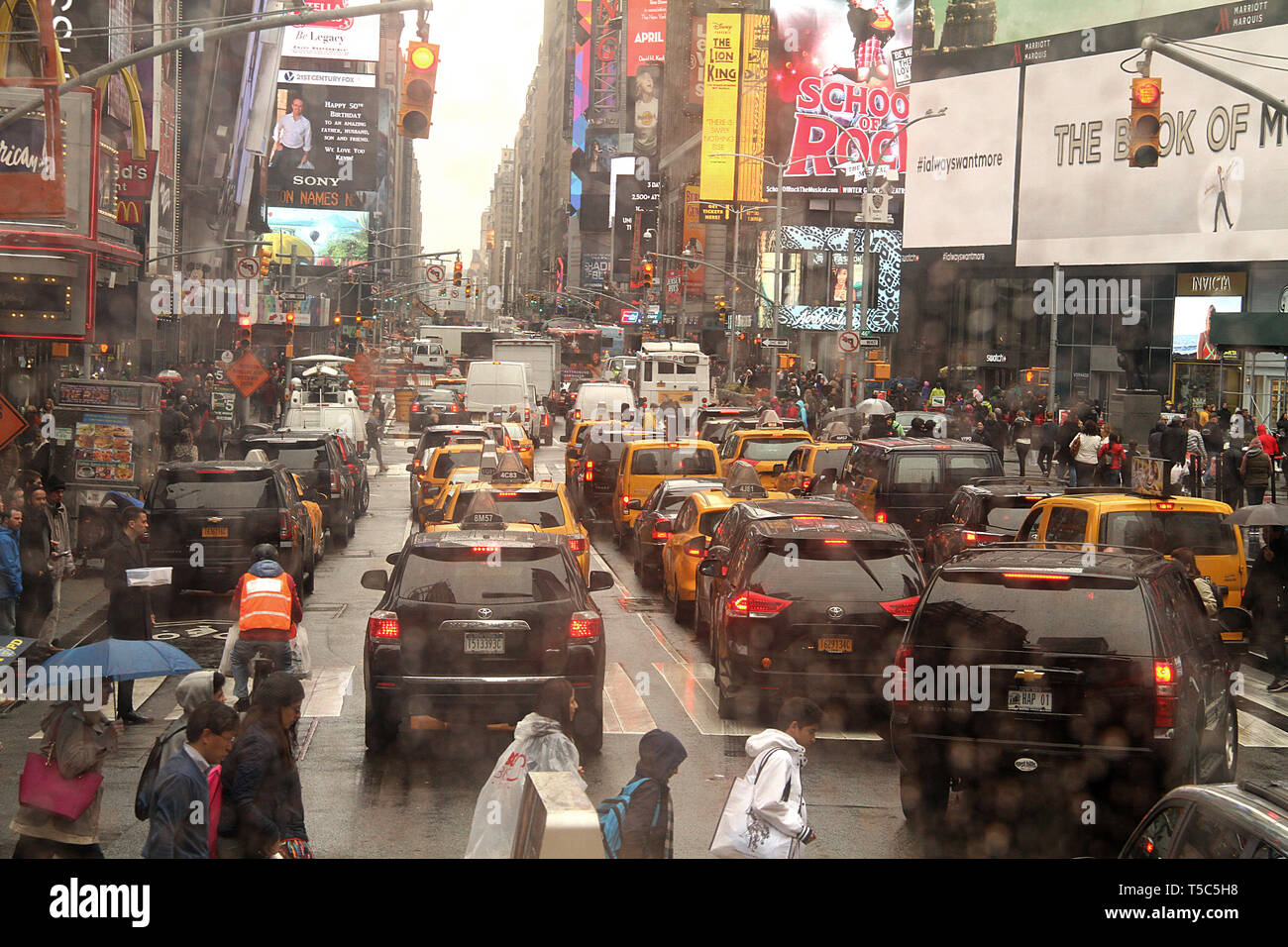 Traffic in Manhattan, New York City, USA. The Times Square on a rainy ...