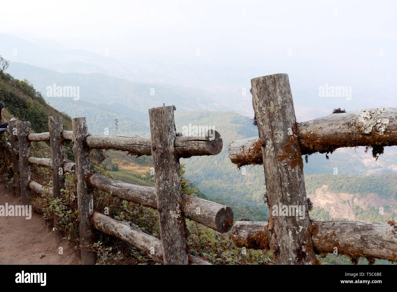Wooden fence on cliff edge, View from Cliff top. Kew Mae Pan Nature Doi ...