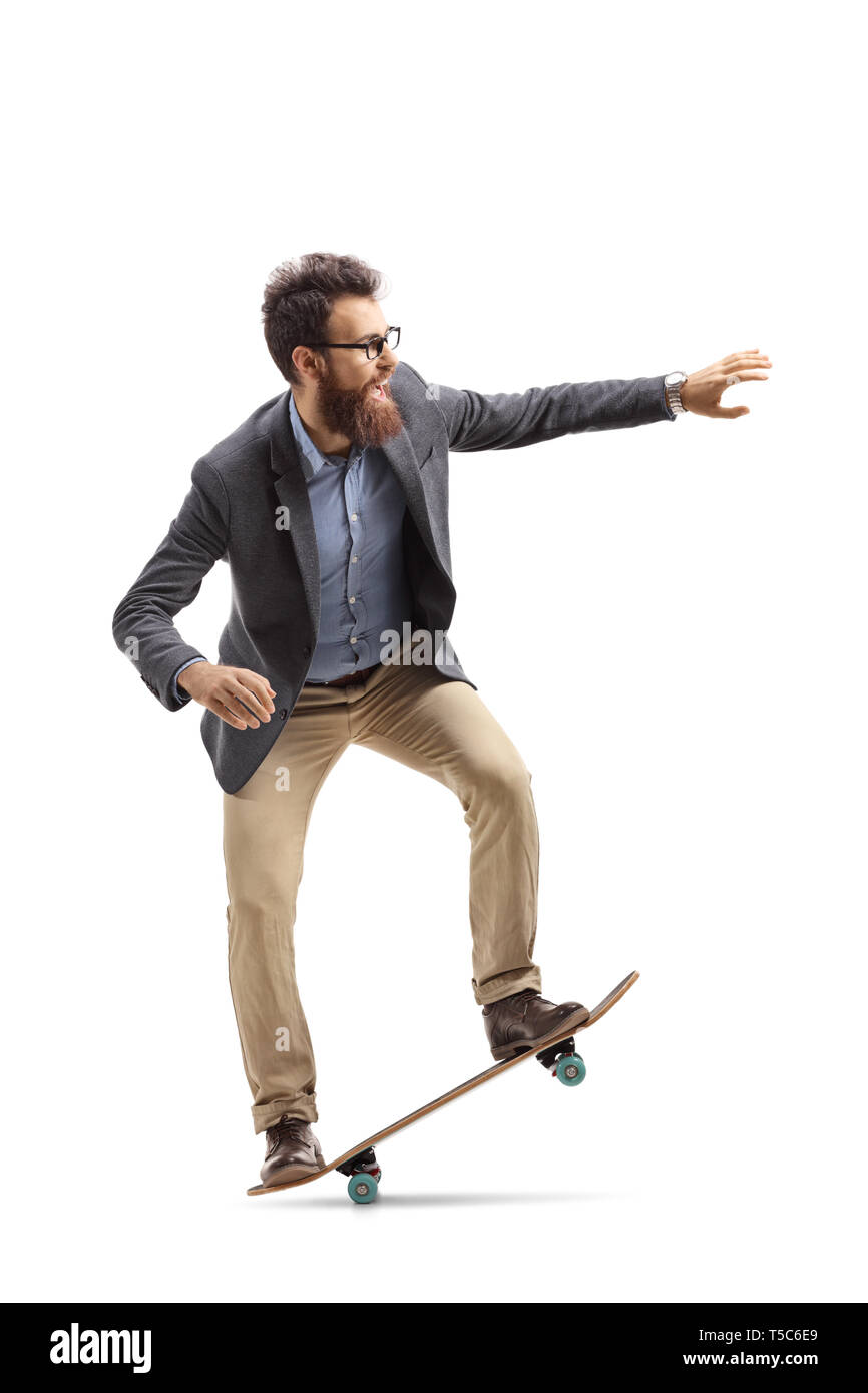 Full length shot of a bearded man in formal clothes riding a skateboard ...