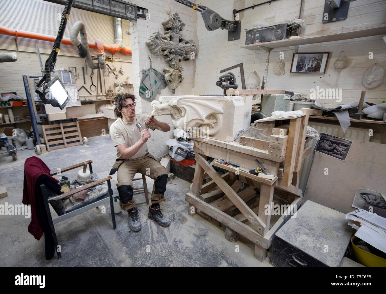 'York Minster stonemason Lee Godfrey works on grotesque during an 11 ...