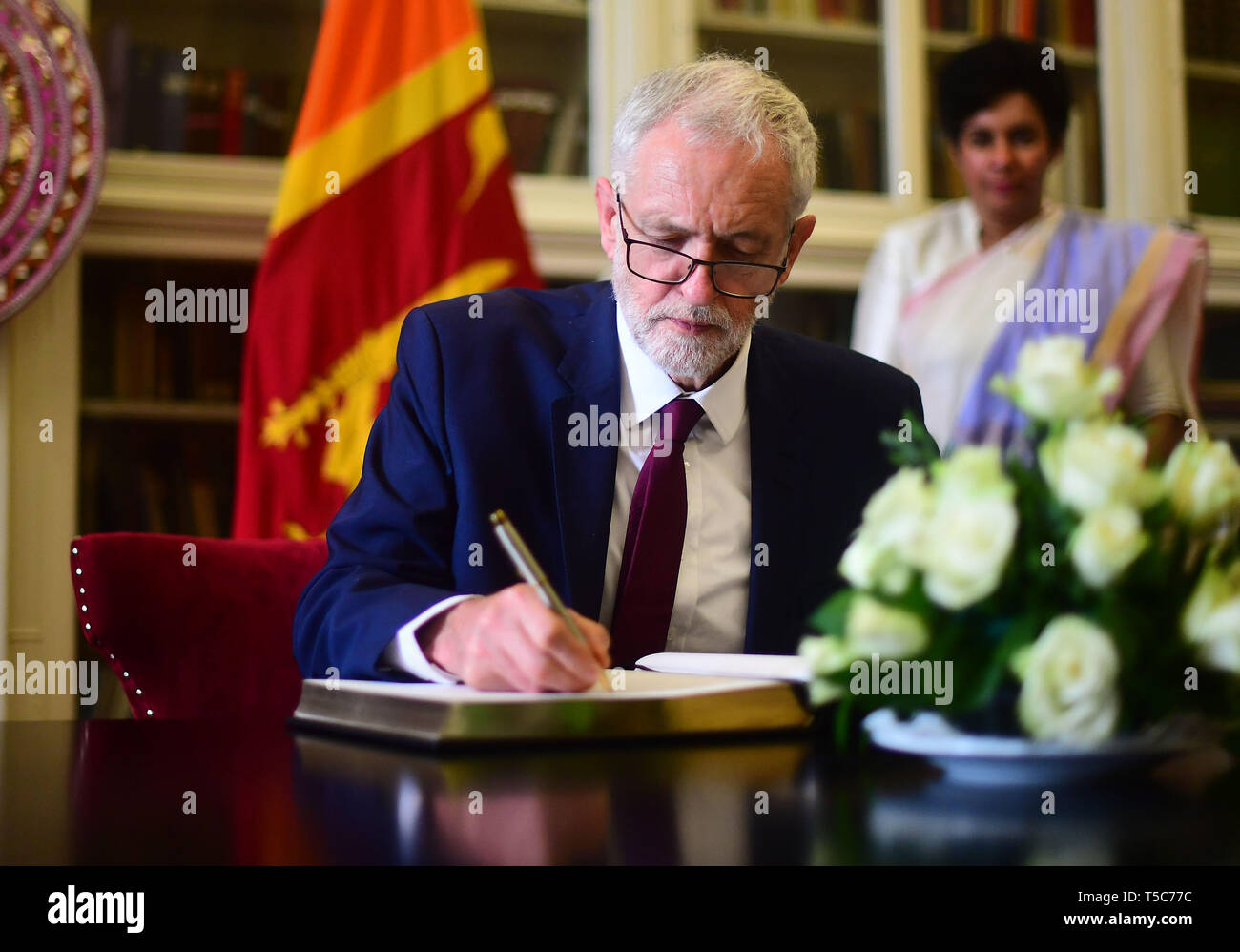 Labour Leader Jeremy Corbyn signs a book of condolence at the Sri ...
