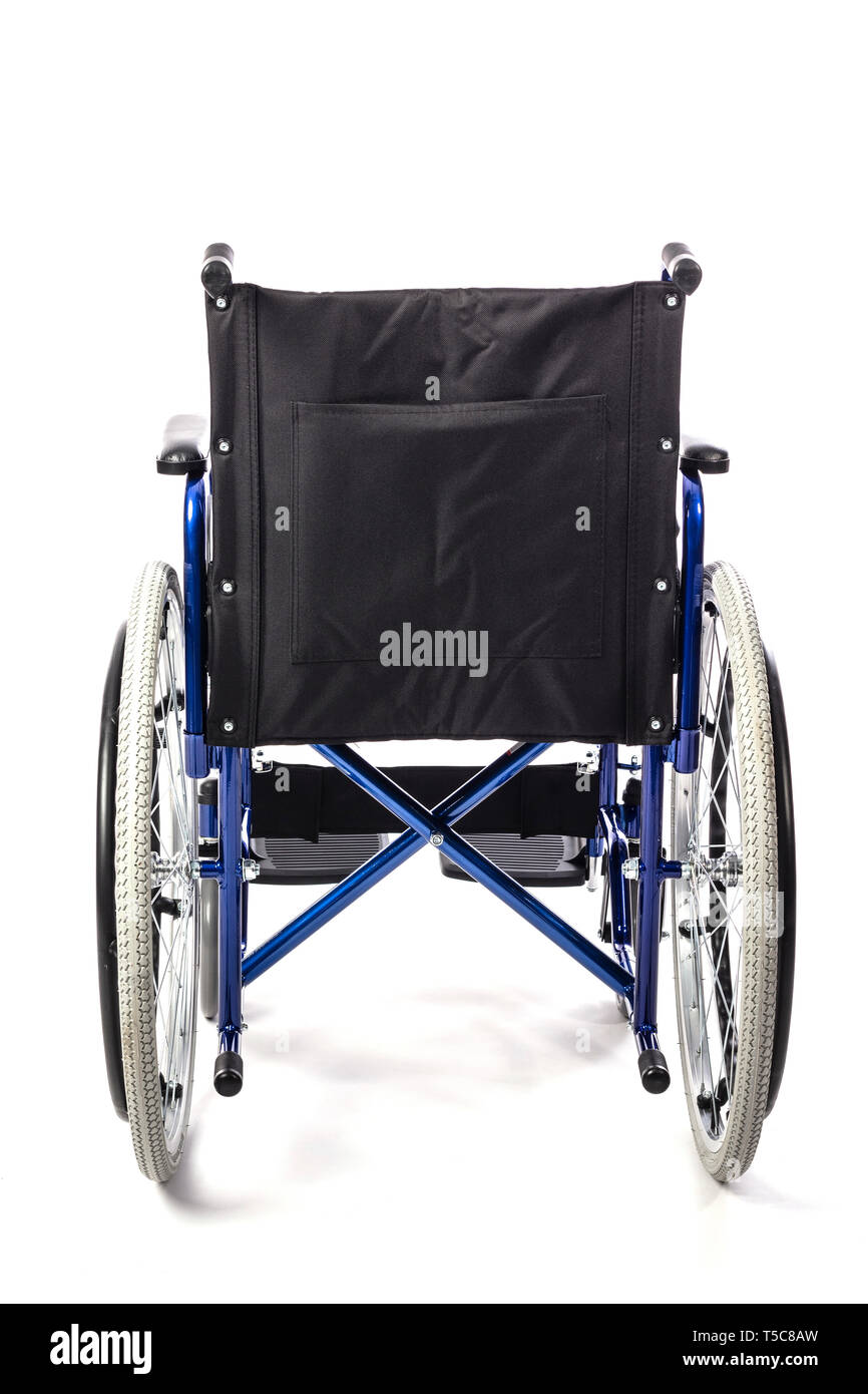 Detail of a classic wheelchair for physical disability on a white ...
