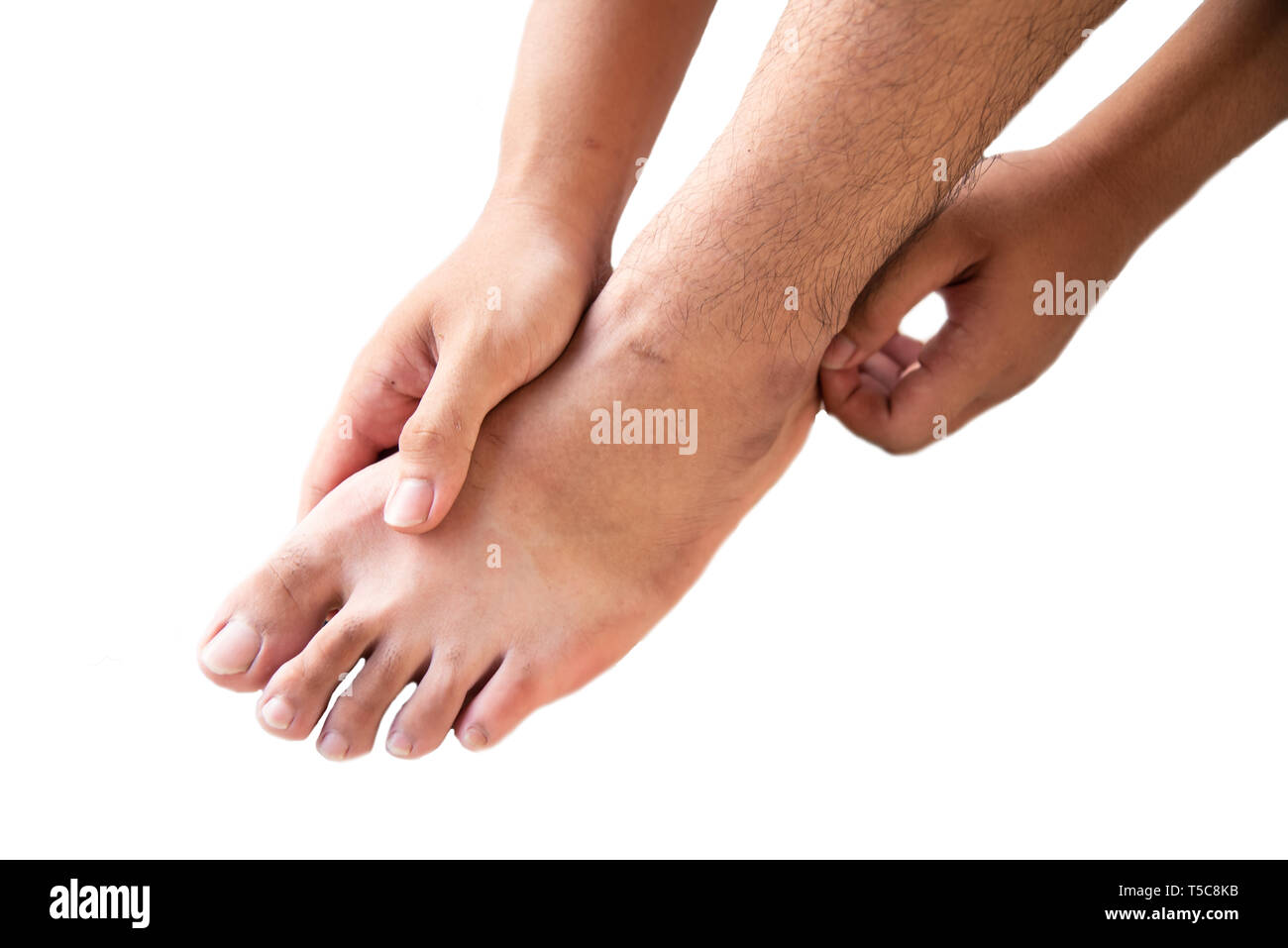foot injury from exercise and workout in young man Stock Photo - Alamy