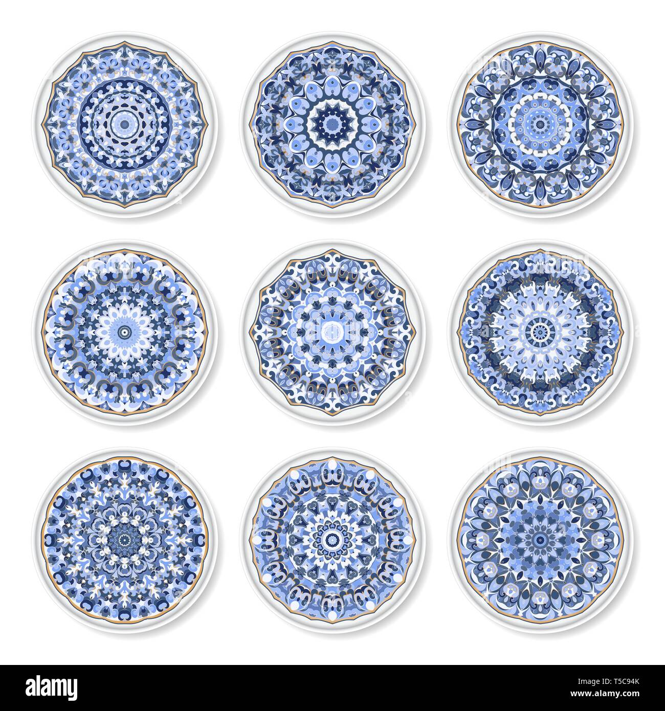 Nine blue plates with ornate Arabic pattern, top view on white ...